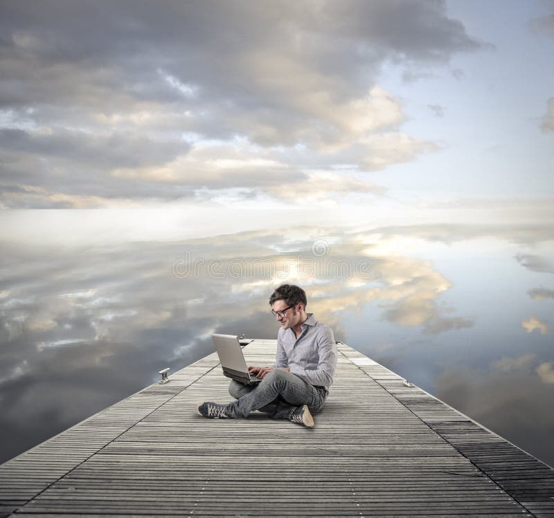 Man using his laptop stock image. Image of laptop, notebook - 39495167
