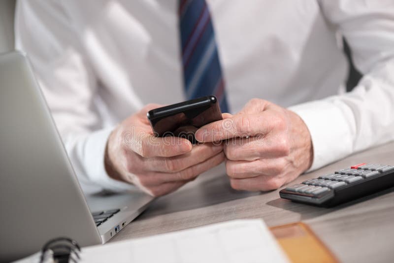 Man using his mobile phone stock photo. Image of message - 191489492