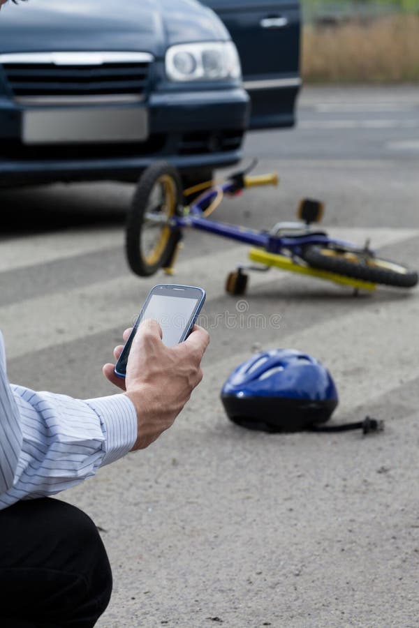 Man Using His Mobile Phone To Call for Help on Road Stock Image - Image ...