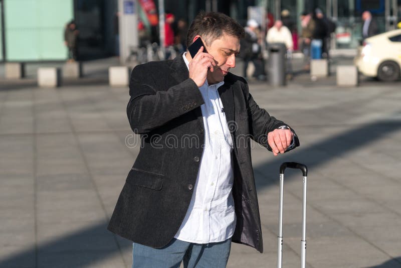 Impatient Man at the Station Stock Image - Image of businessman ...