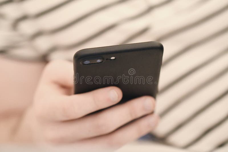A man using his phone stock image. Image of connection - 224621183