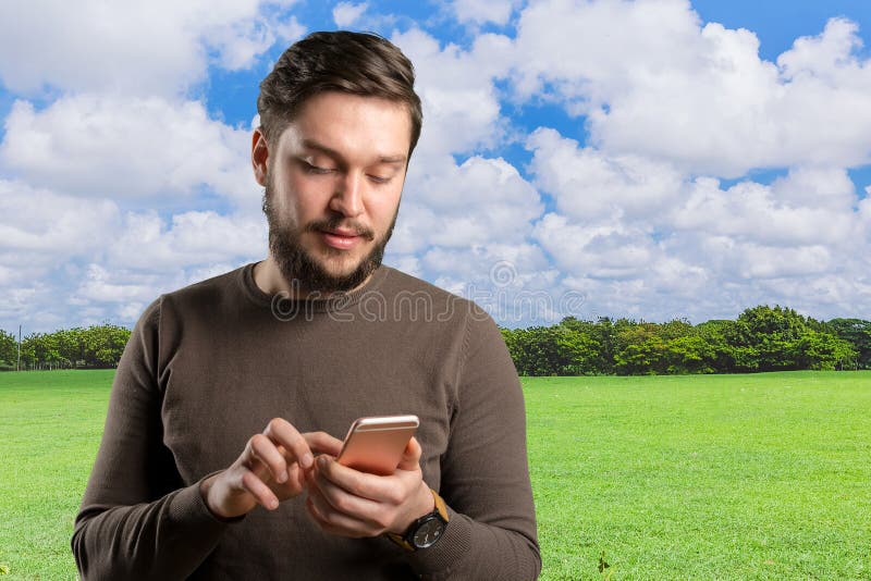 Man using his smartphone stock photo. Image of quarter - 67273316 Man using his smartphone stock photo. Image of quarter - 67273316