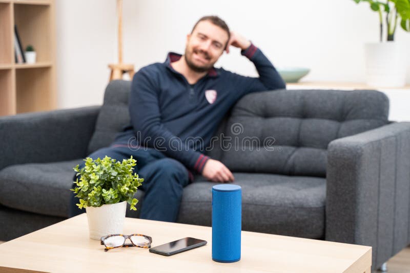 Man Using Home Assistant Bluetooth Speaker Stock Image - Image of ...