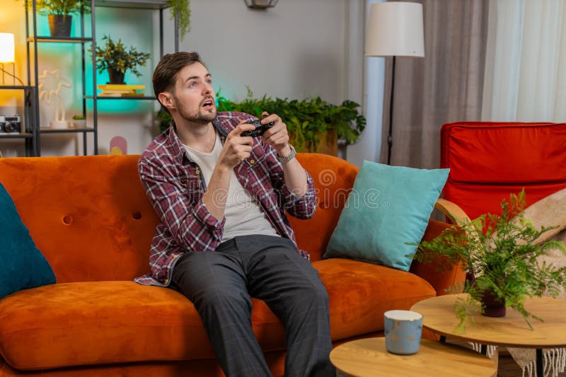 Man Using Joystick Controller Playing Video Console Television Game Fun ...