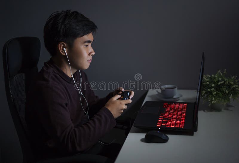Man Using Joystick To Playing Games Stock Image - Image of laptop ...