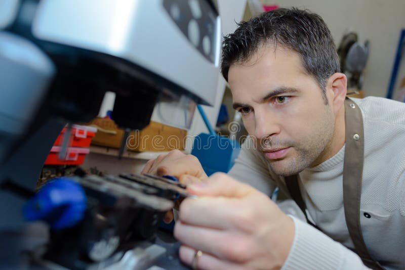 Man Using Key Copying Machine Stock Photo - Image of setup, steel ...