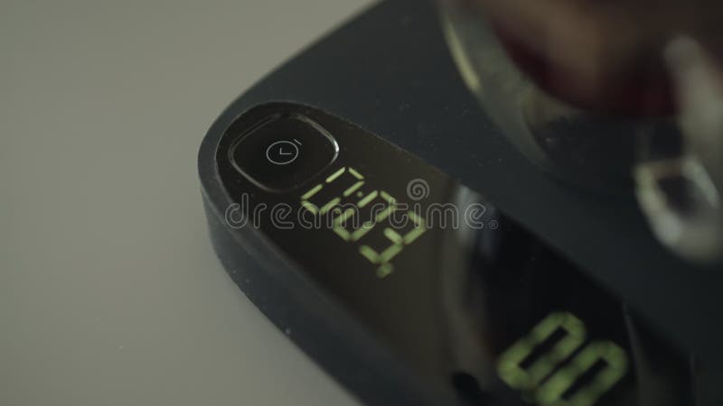 Man Using Kitchen Scale To Accurately Measure Coffee, Pushing Tare ...