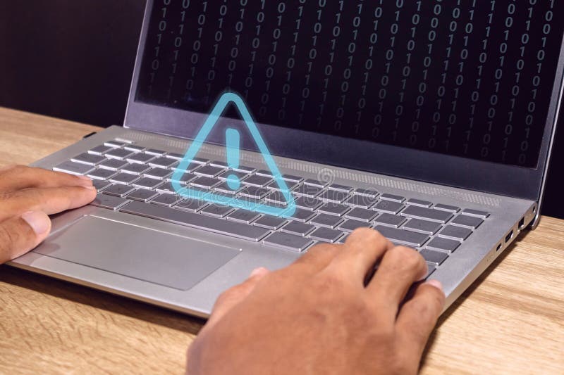 Man Using a Laptop with Blue Triangle Caution Warning Sign for ...