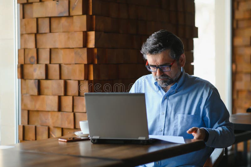 Man Using Laptop in Cafe Bar Stock Image - Image of design, coffee ...