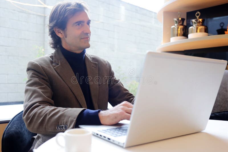 Man Using Laptop in a Cafe Bar Stock Image - Image of person, modern ...