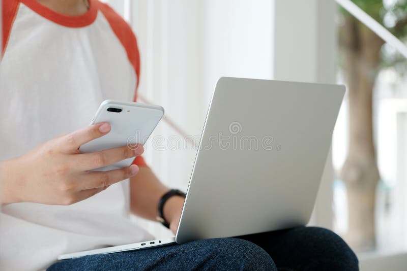 Man Using Laptop Computer and Smart Phone, People and Technology Stock ...