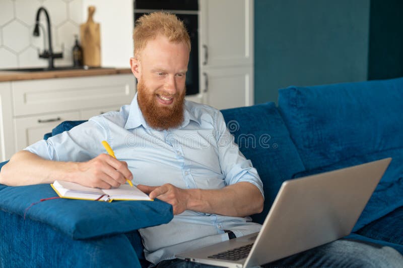 Man Using Laptop Computer for Studying and Work on the Distance Stock ...