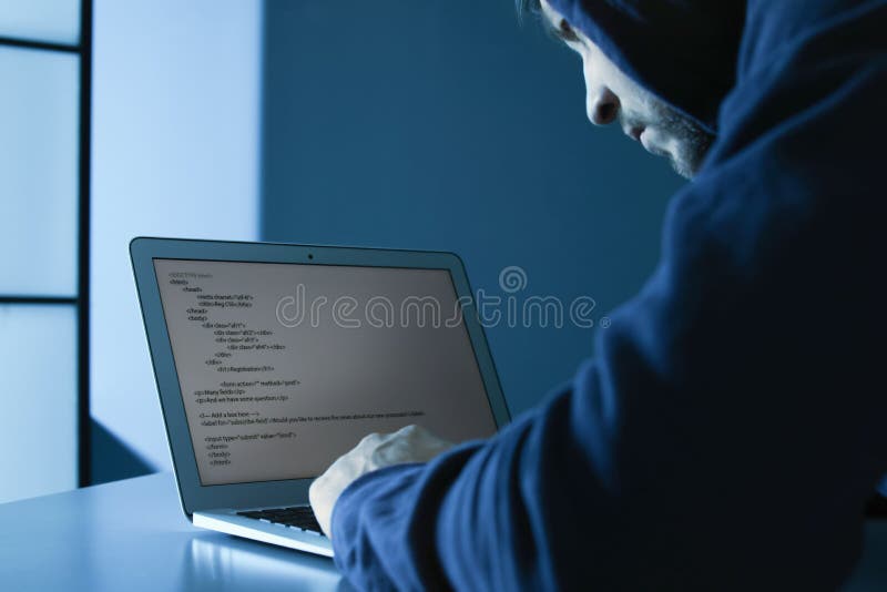 Man Using Laptop in Room. Criminal Offence Stock Photo - Image of night ...