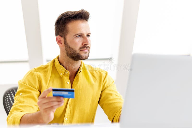 Man Using Laptop and Doing Online Banking Stock Image - Image of ...