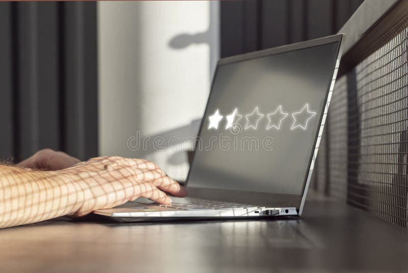 Man Using Laptop for Negative Online Review. Giving Bad Feedback in ...