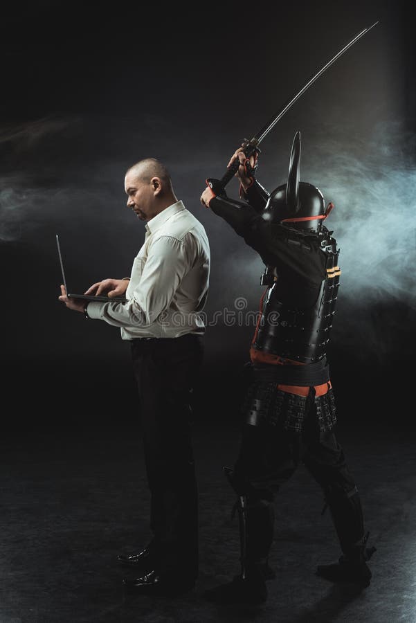 Man Using Laptop while Samurai Making Hit Stock Image - Image of ...