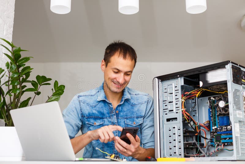 Man Using Laptop To Check Servers in Data Center Stock Image - Image of ...