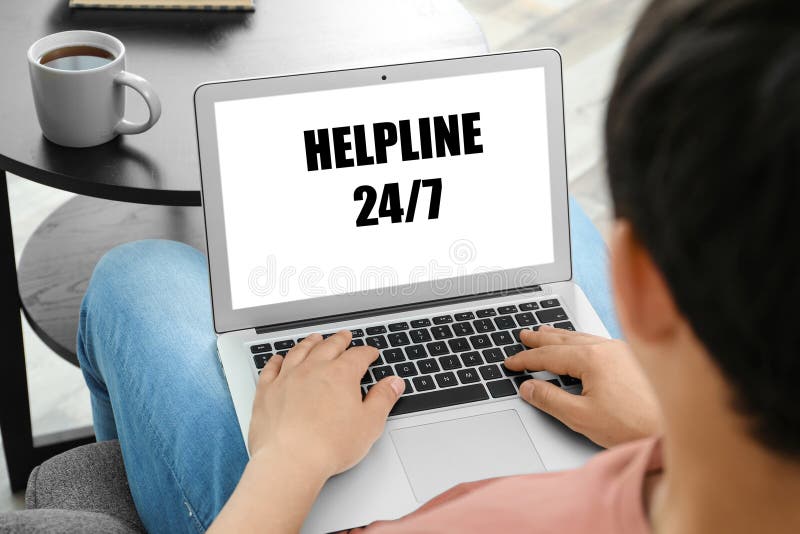 Man Using Laptop To Contact with Online Technical Support Stock Photo ...