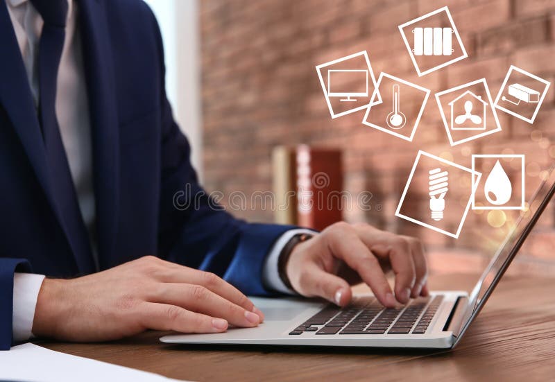 Man Using Laptop To Control Smart Home. Automatic Systems Stock Photo ...