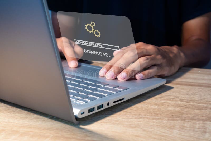 Man Using Laptop To Download Media or Update Software. Downloading ...