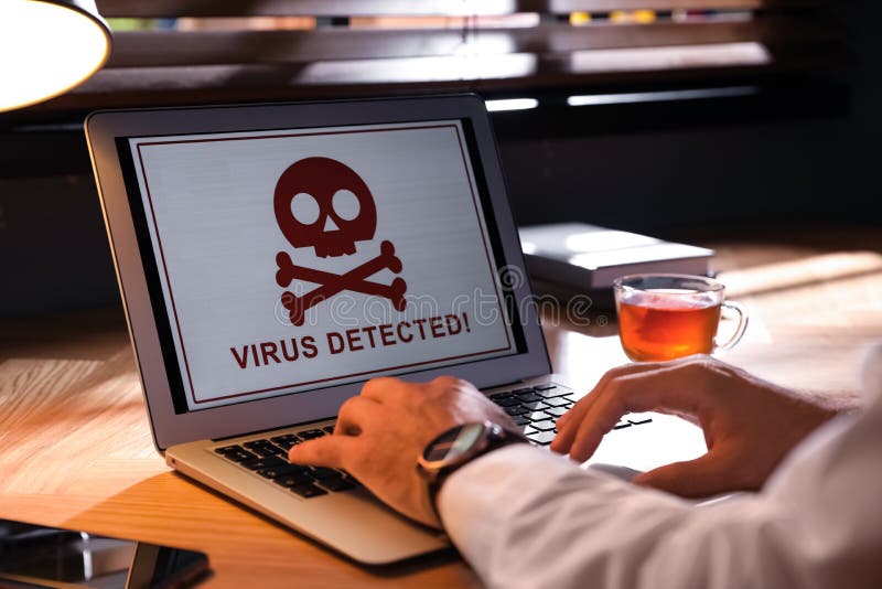 Man Using Laptop with Warning about Virus Attack at Workplace, Closeup ...