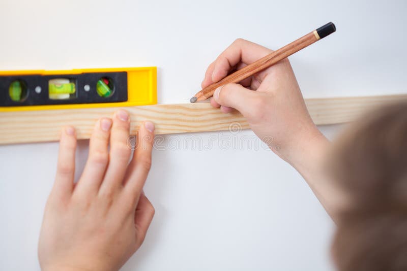 Man using a level stock image. Image of flat, renovated - 43415961