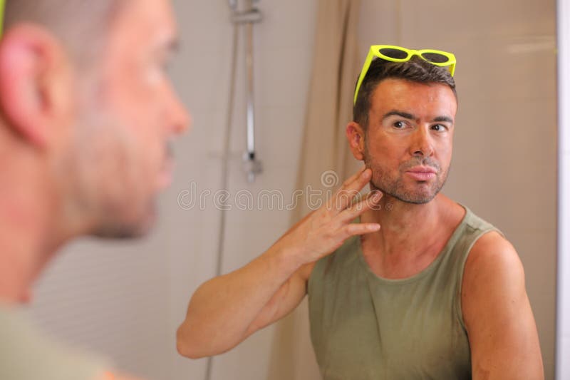 Man Using a Lot of Self Tanning Lotion Stock Photo - Image of ...