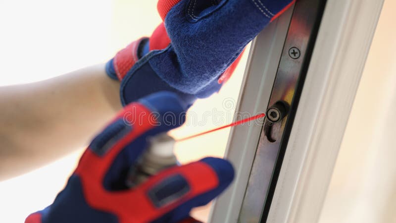 Man Using Lubricate in Spray Can for Lock of Window Stock Image - Image ...