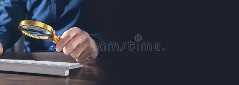 Man Using Magnifying Glass and Typing in Computer Keyboard. Concept of ...