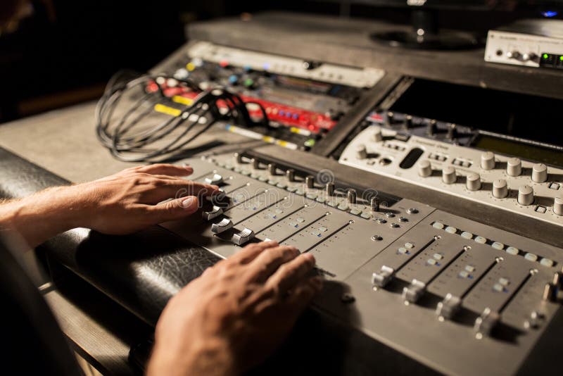 Man Using Mixing Console in Music Recording Studio Stock Image - Image ...