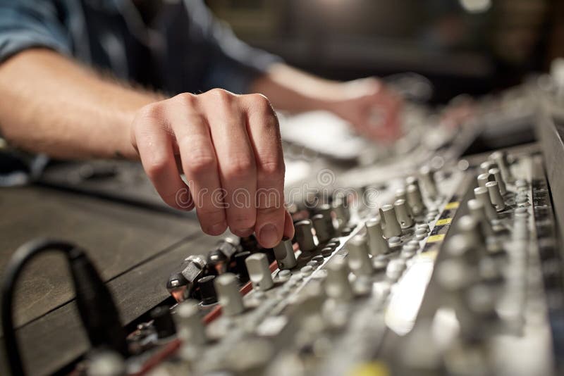 Man Using Mixing Console in Music Recording Studio Stock Photo - Image ...