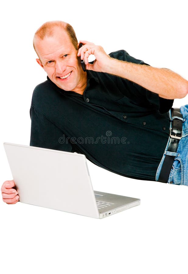 Man on Cell Phone and Laptop Stock Photo - Image of cell, inside: 12543576