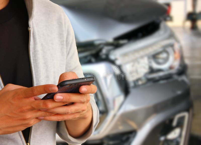 Man is Using Mobile Phone Calling Insurance Surveyor when Has Car ...