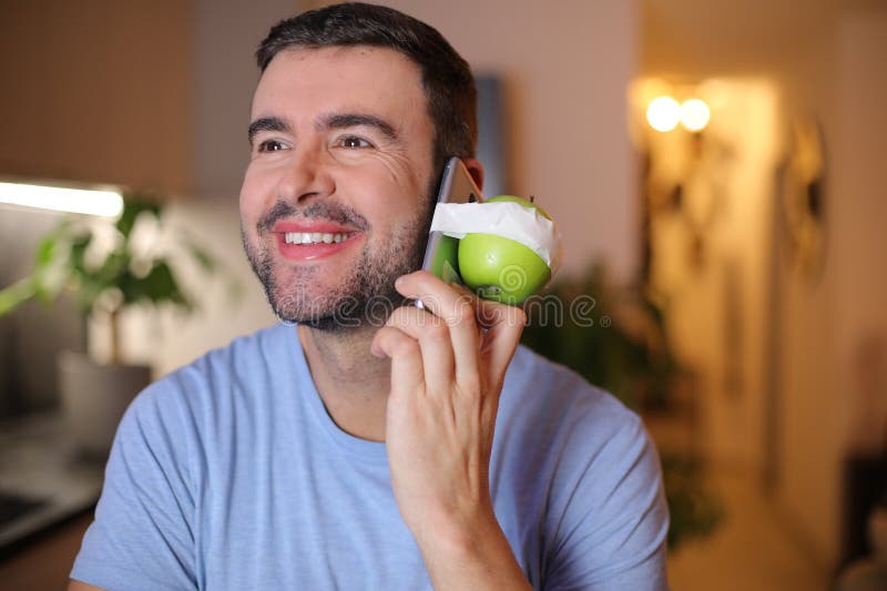 Man Using Mobile Phone Has Fruit Attached Stock Photos - Free & Royalty ...