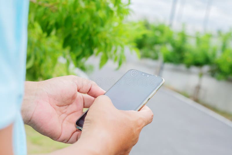 Man is using mobile phone stock image. Image of message - 159982869