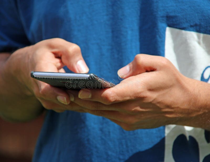 Man Using Mobile Phone Outside. Stock Photo - Image of facetime, veins ...