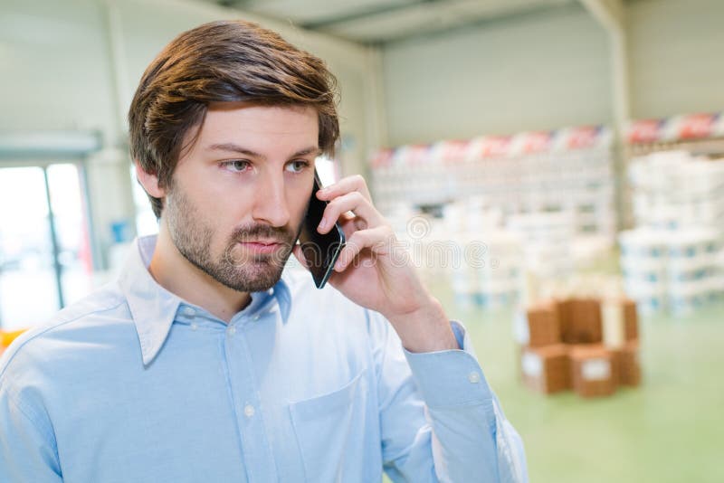 Man Using Mobile Phone while Shopping in Hardware Store Stock Image ...