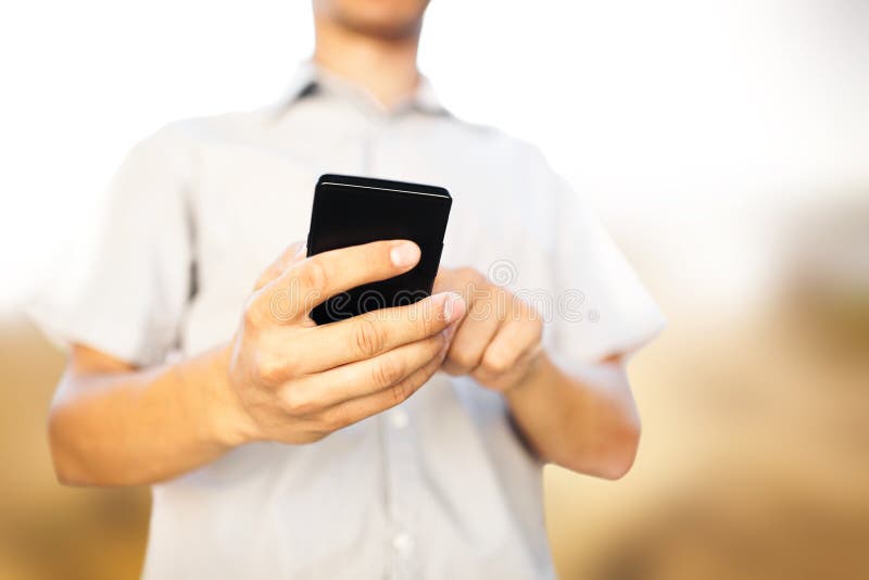 Close Up of a Man Using a Mobile Smartphone Stock Photo - Image of ...