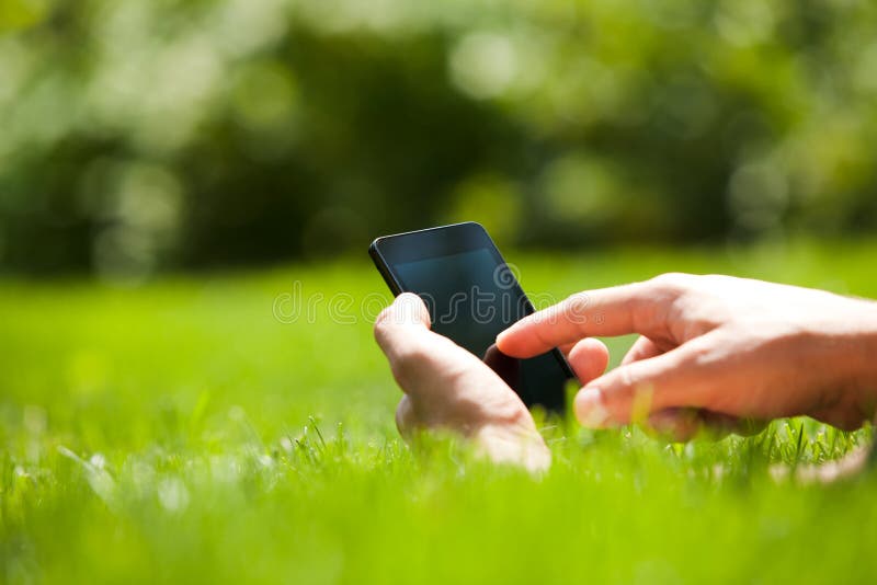 Mobile Cell Phone on Grass Outside Stock Photo - Image of design ...