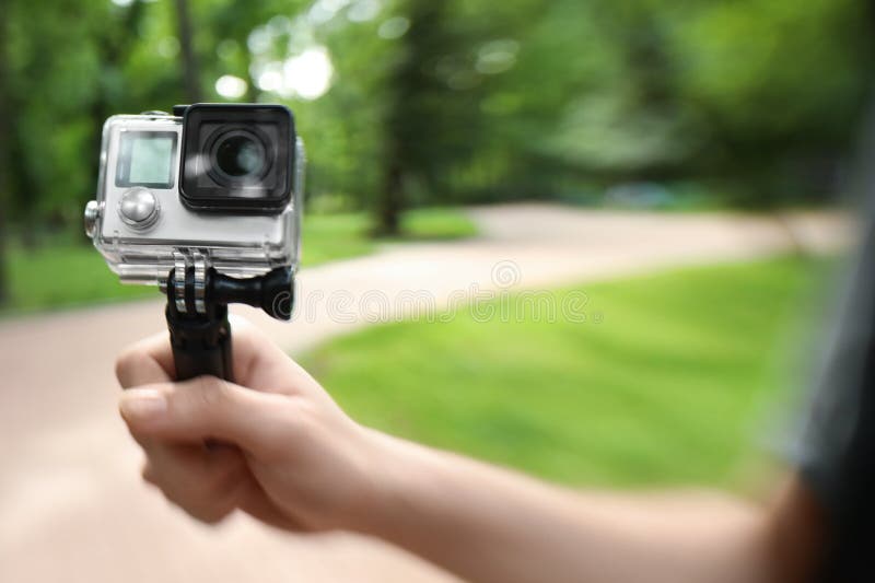 Man Using Modern Action Camera Outdoors, Closeup Stock Photo - Image of ...