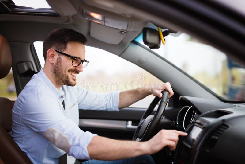 Man Using Navigation System while Driving Car Stock Photo - Image of ...