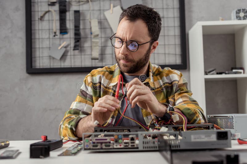 Man Using Multimeter while Fixing Stock Image - Image of tech ...