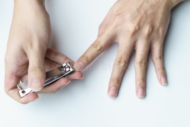 Man Using Nail Clipper Clipping Her Fingernails Stock Image - Image of ...