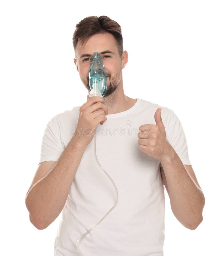 Man Using Nebulizer for Inhalation and Showing Thumb Up on White ...