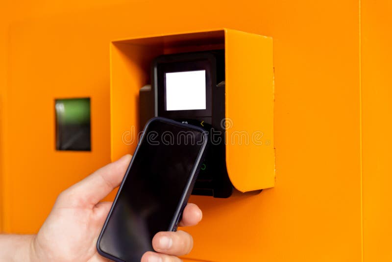 Man Using NFC Technology on Smart Phone To Enter the Code and Recieve ...
