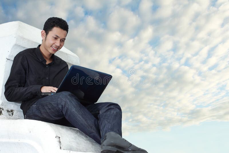 Man Using Notebook Outdoors Stock Photo - Image of male, summer: 17879076