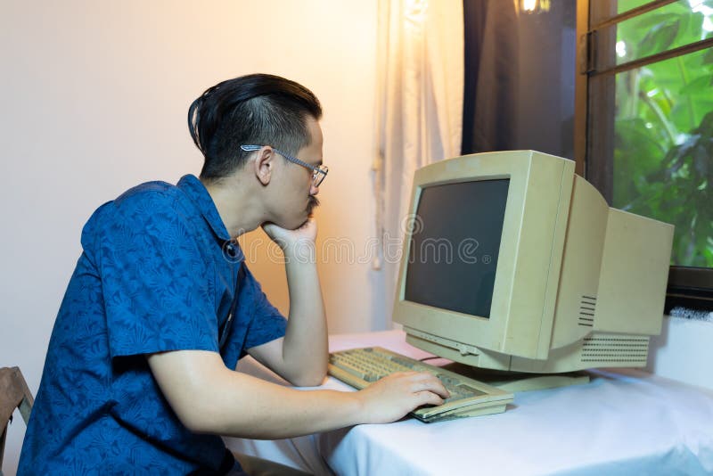 A Man Using an Old Personal Computer . Stock Photo - Image of internet ...