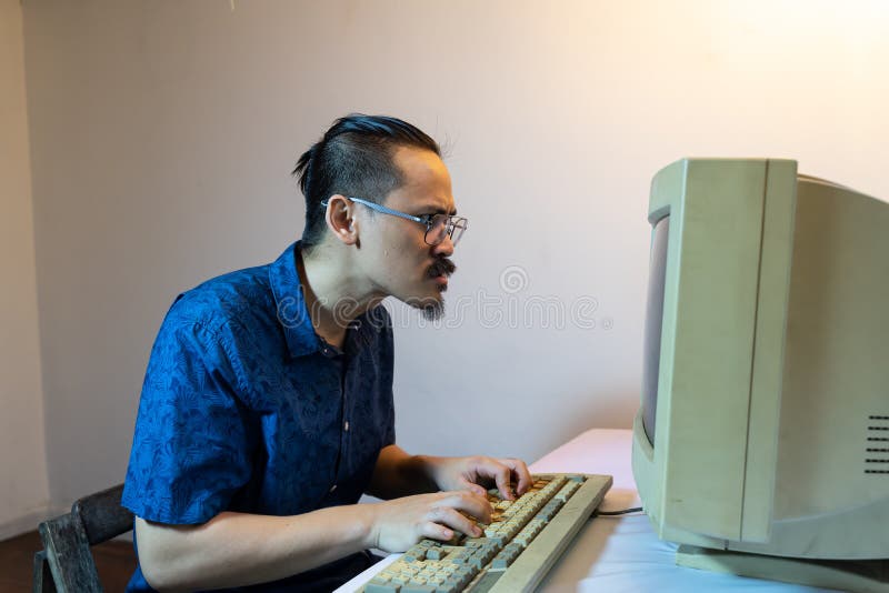 A Man Using an Old Personal Computer . Stock Image - Image of computer ...