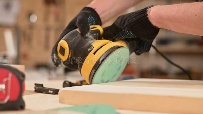 Man Using Orbital Wood Sander in Workshop. Stock Footage - Video of ...
