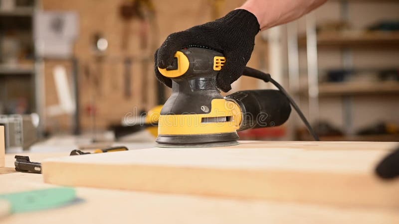 Man Using Orbital Wood Sander in Workshop. Stock Footage - Video of ...